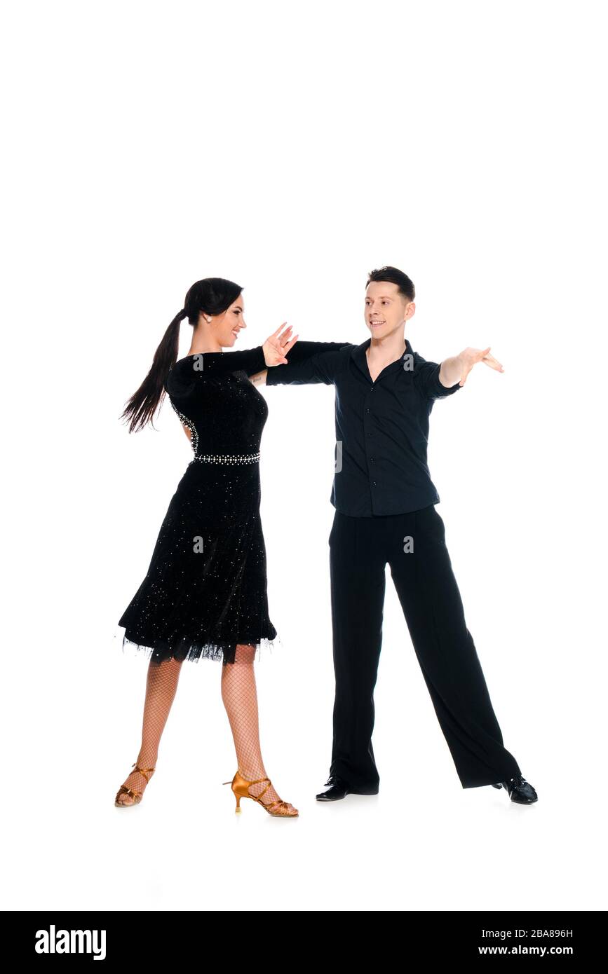 elegant young couple of ballroom dancers in black dress and suit ...