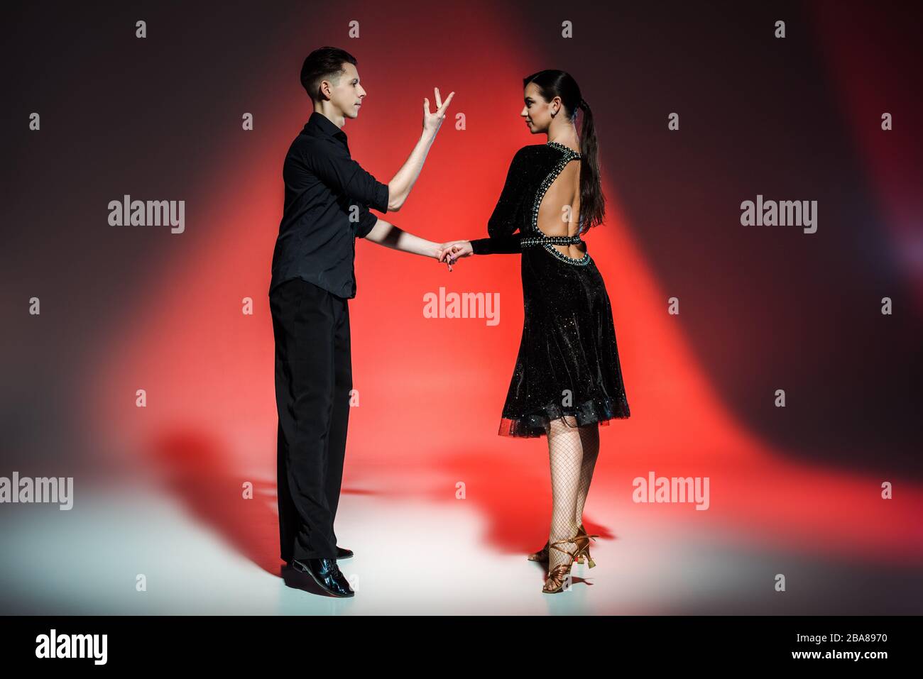 Couple ballroom dance outfits hi-res stock photography and images - Alamy