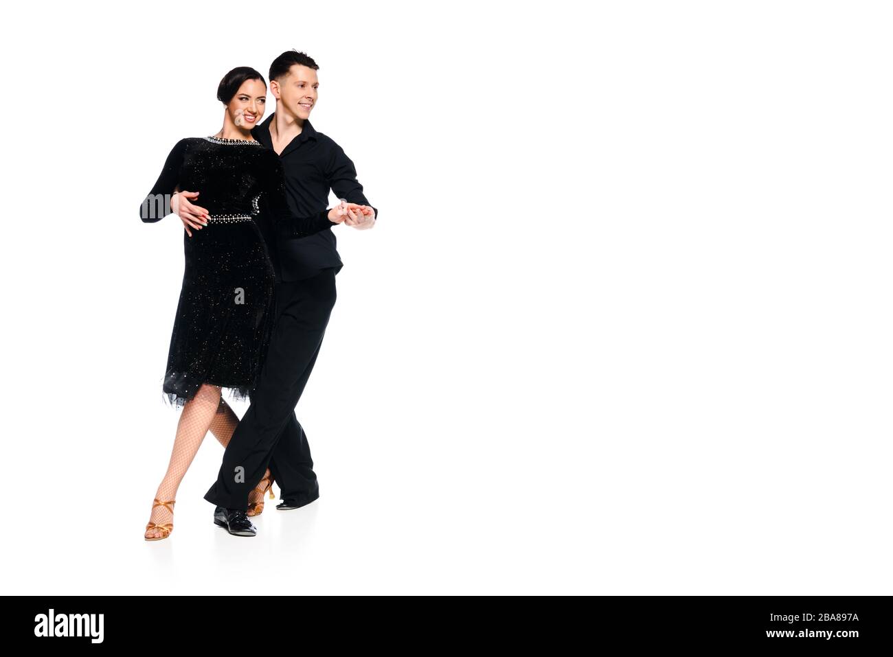 Couple in black suit dancing hi-res stock photography and images - Alamy