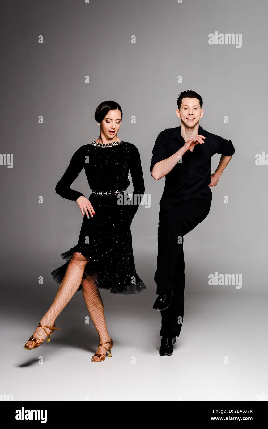Couple in black suit dancing hi-res stock photography and images - Alamy