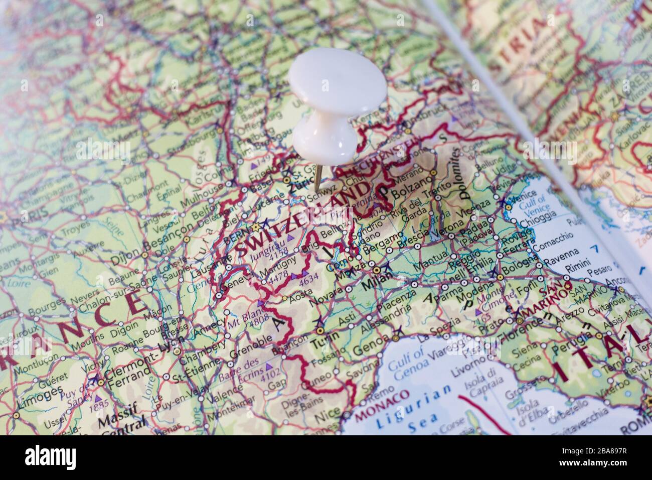 Switzerland on the map of the world or atlas Stock Photo - Alamy