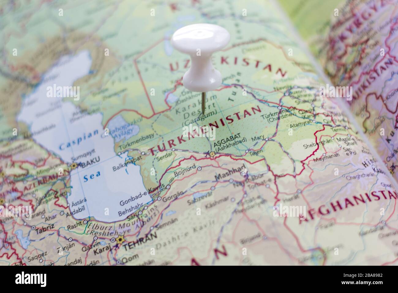 Turkmenistan on the map of the world or atlas Stock Photo - Alamy