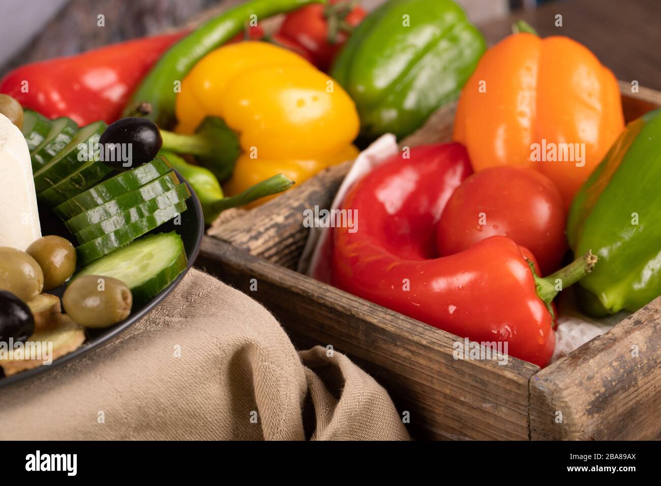 Color chili peppers mix in a rustic tray Stock Photo - Alamy