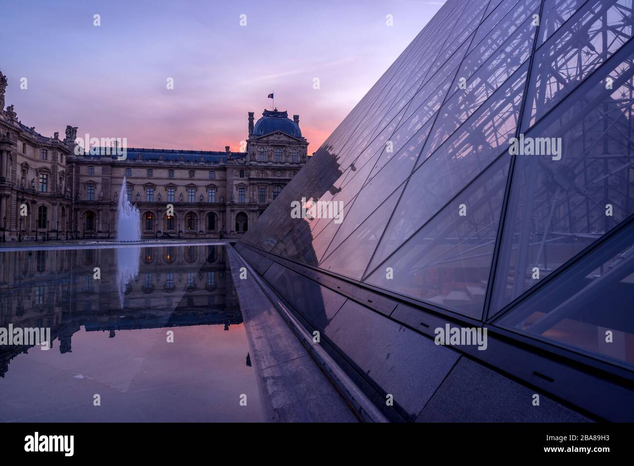 PARIS, FRANCE - MARCH 19, 2020: View of famous Louvre Museum with ...