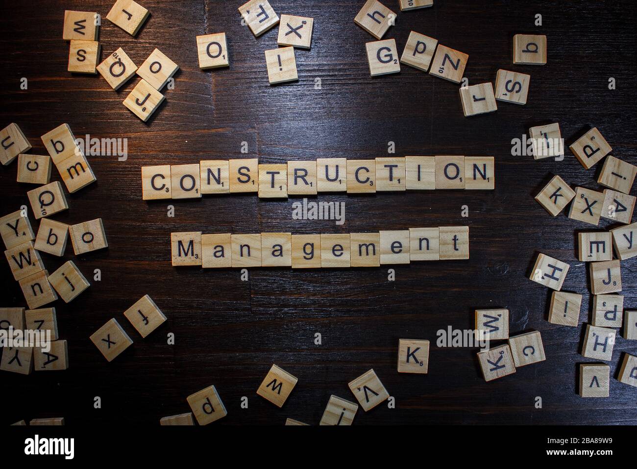 Word or phrase Construction Management made with scrabble letters on ...