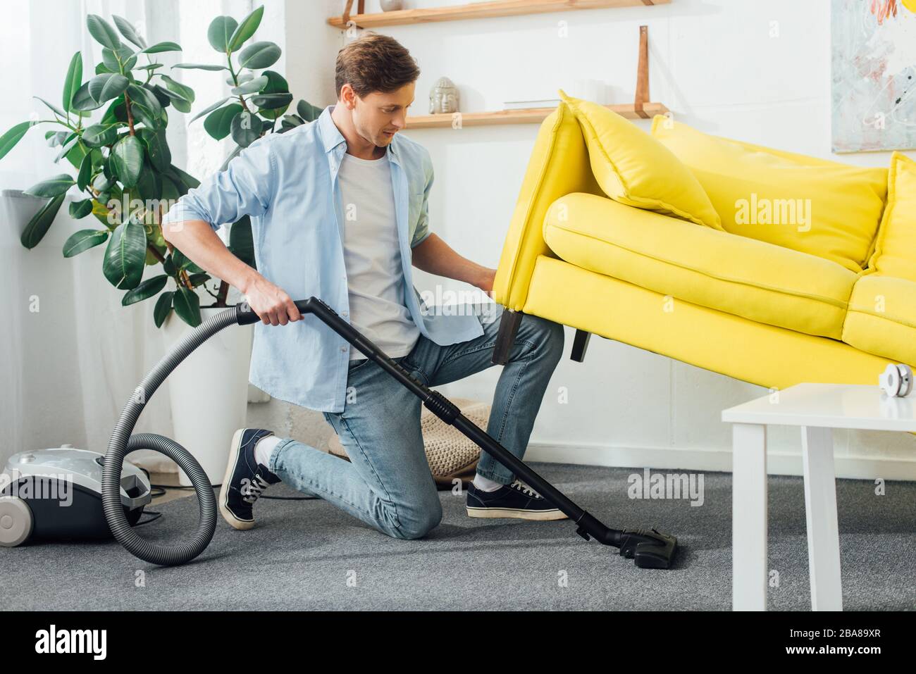 Carpet man lifting hi-res stock photography and images - Alamy