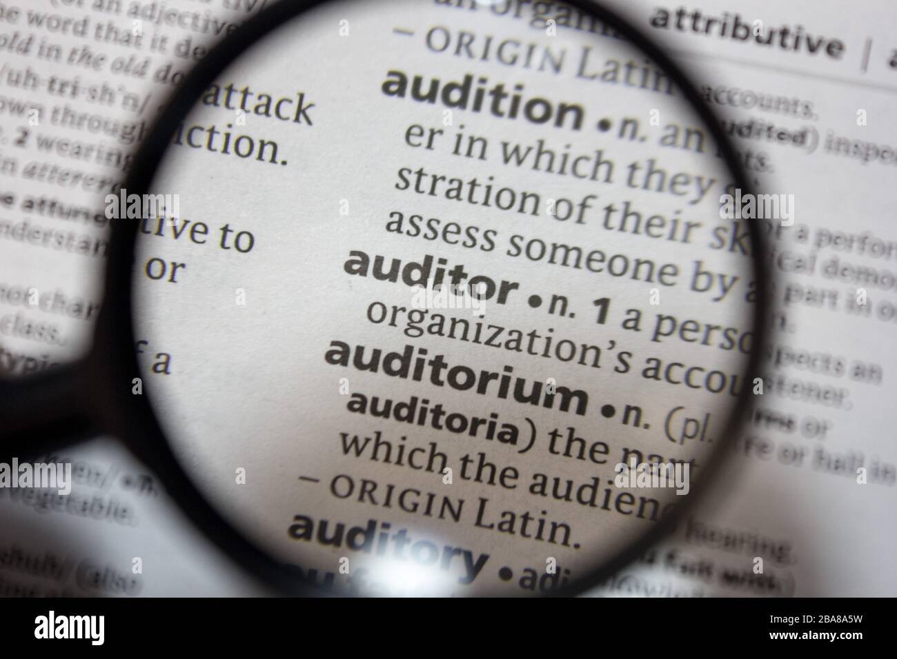 The word of phrase auditor in a dictionary Stock Photo - Alamy