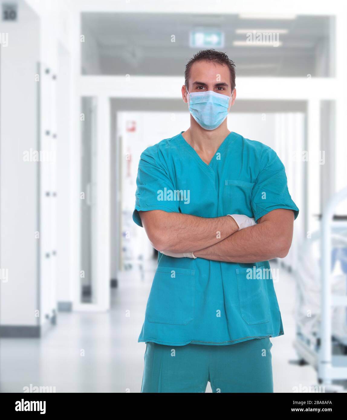 Male doctor wearing a face mask at the hospital Stock Photo - Alamy