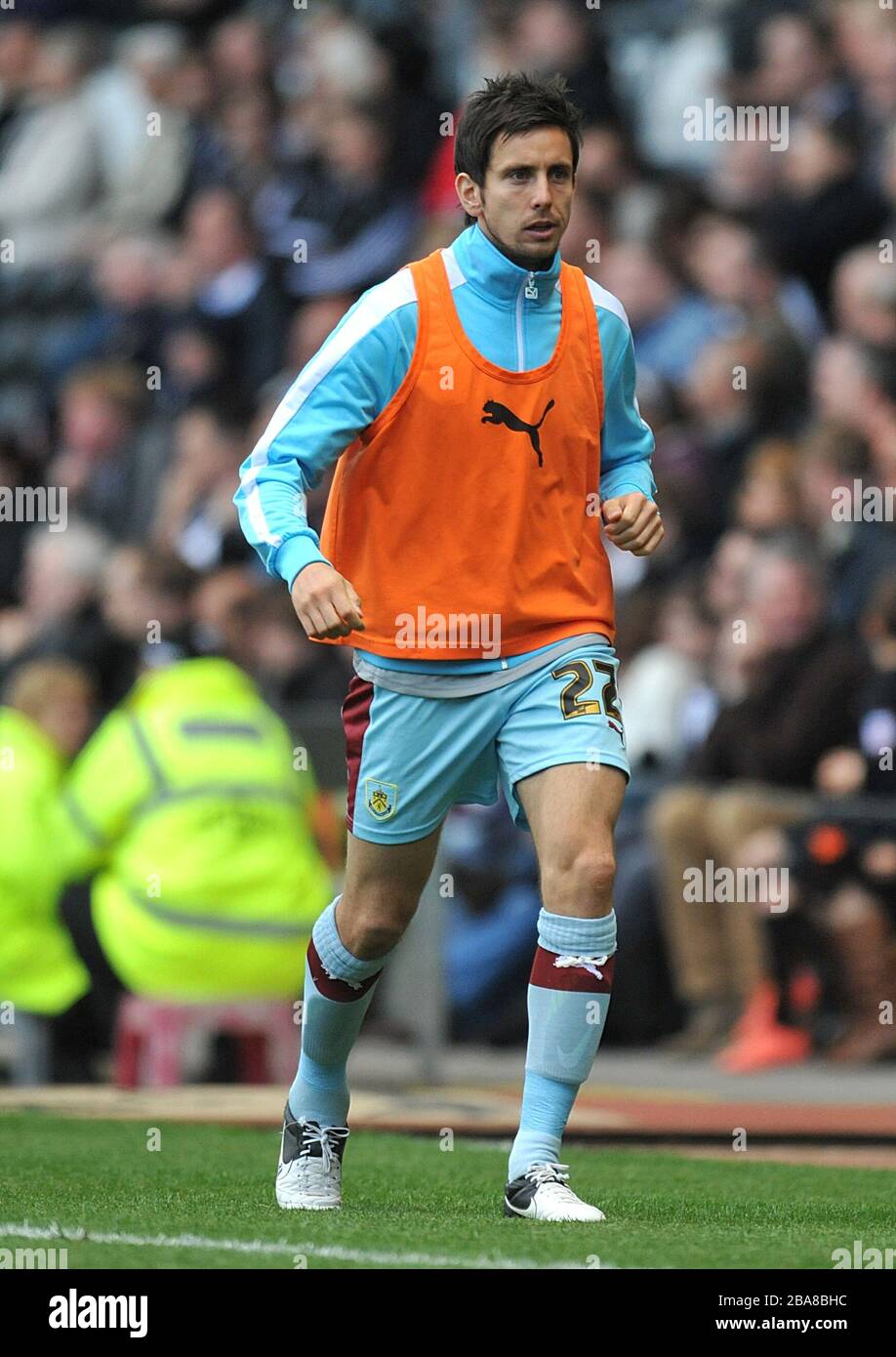 Burnley's Brian Stock warms up on the touchline Stock Photo - Alamy