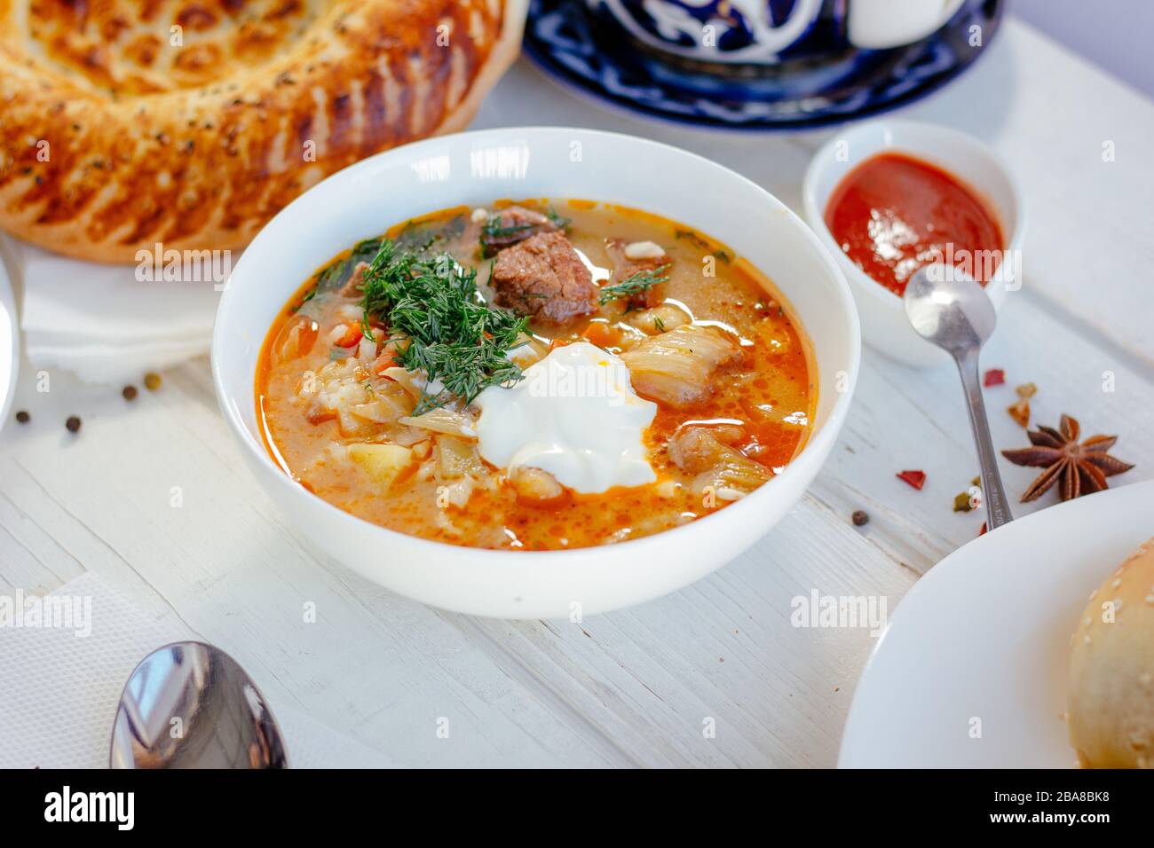 Mastava - uzbek rice soup on white table, great image for your needs ...