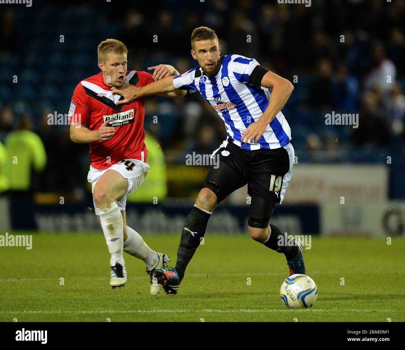 Sheffield wednesdays mark beevers holds off huddersfield towns keith ...