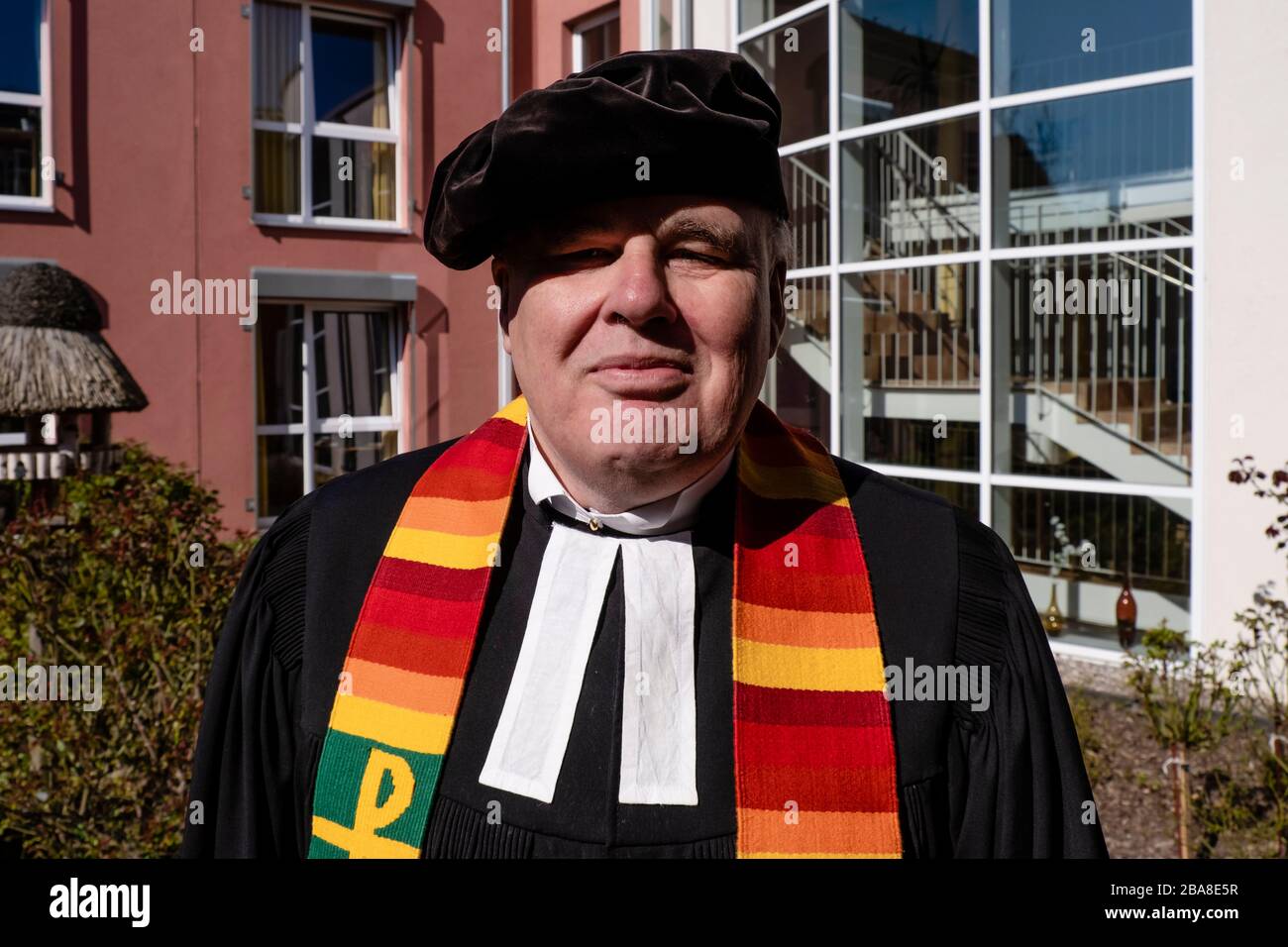 Garding, Germany. 26th Mar, 2020. Pastor Ralf Thomas Knippenberg is ...