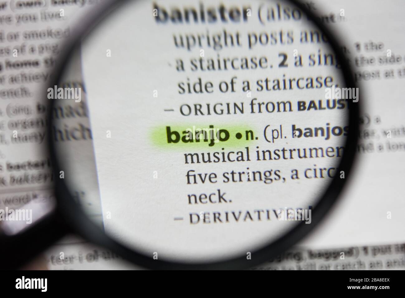 The word or phrase banjo in a dictionary Stock Photo - Alamy