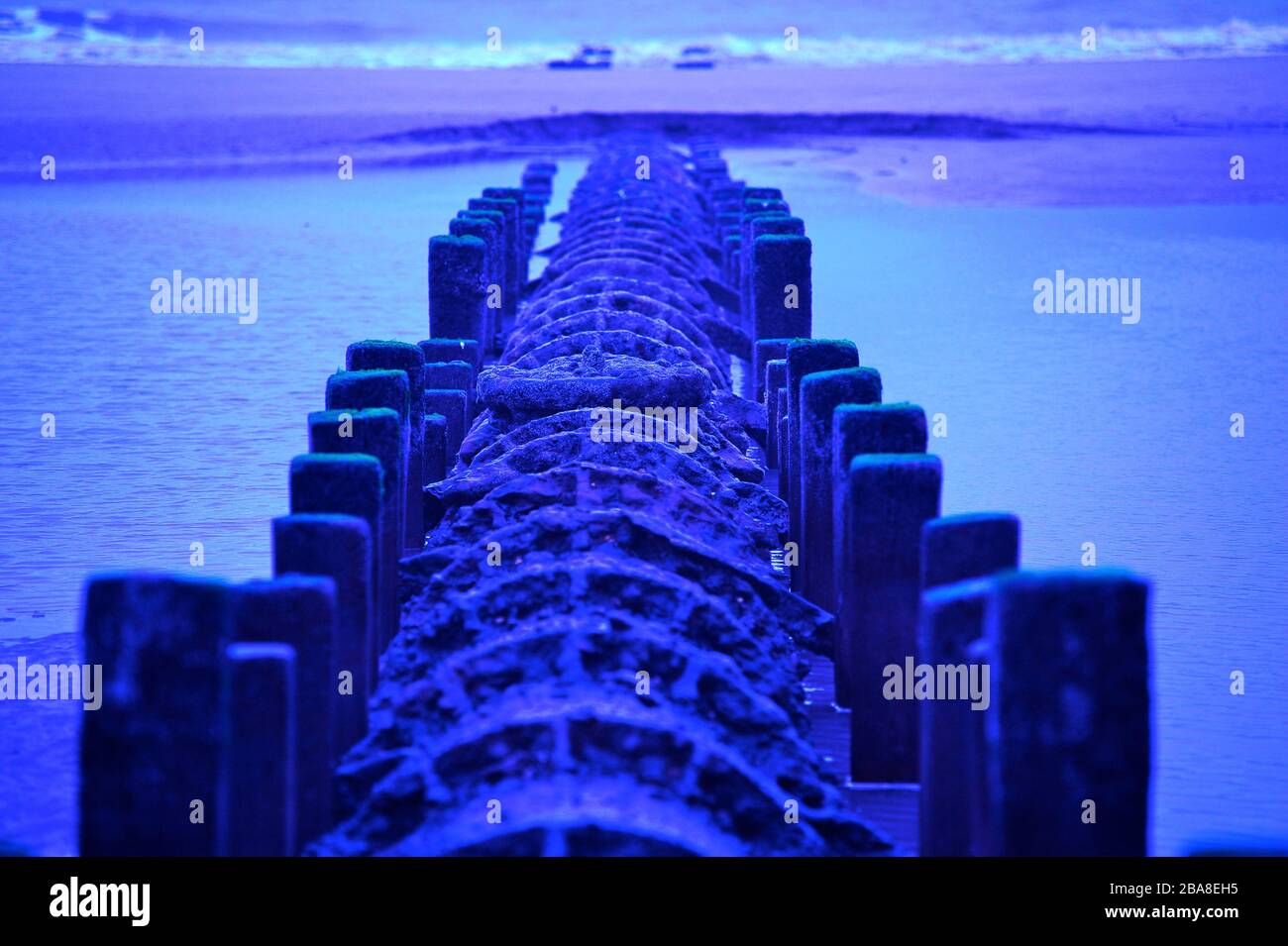 Old outlet pipe leading into sea Stock Photo - Alamy