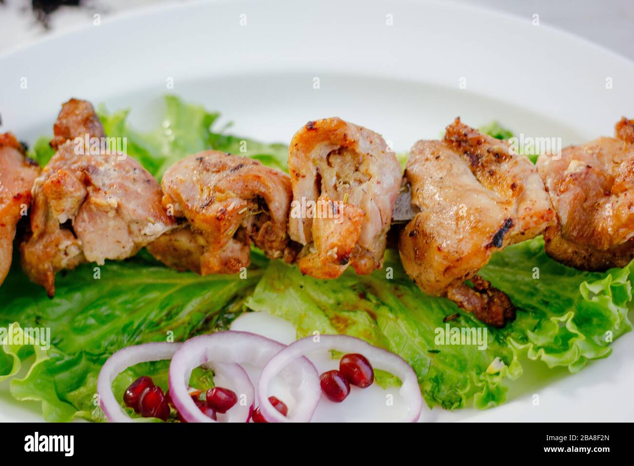 Fresh barbecue meat on white plate, great image for your needs Stock ...