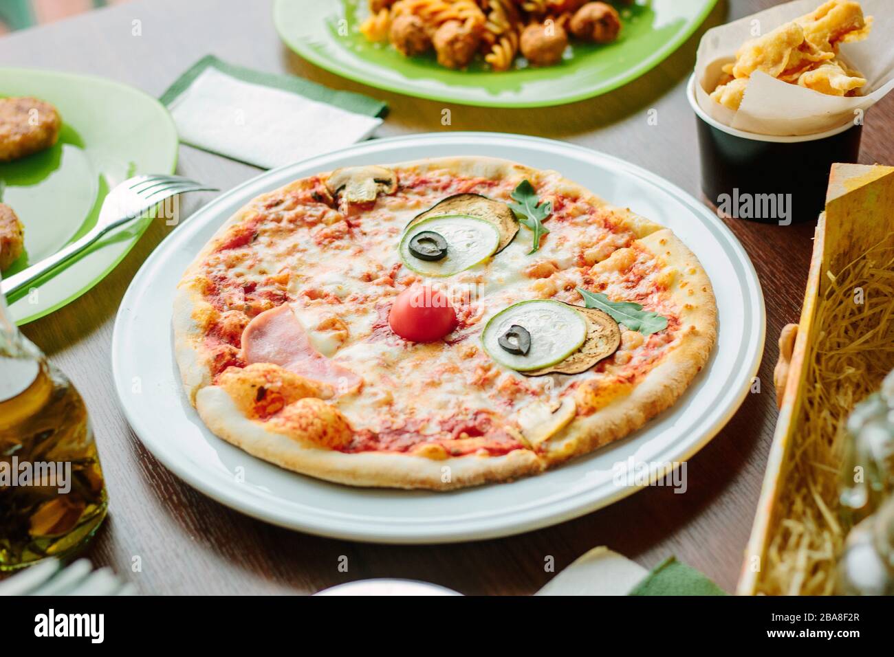 Funny face pizza for kids in a restaurant, great image for your needs ...