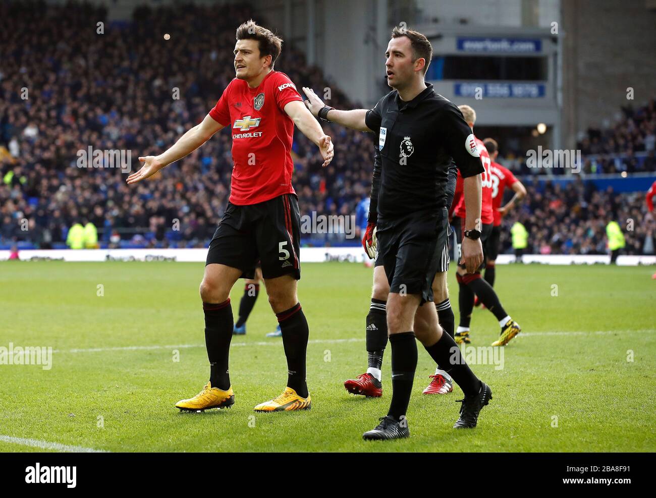 Manchester United's Harry Maguire (left) appeals to referee Chris ...