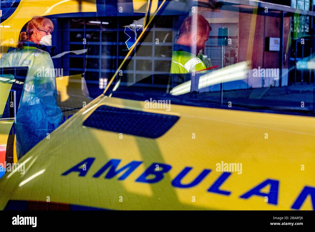 A paramedic inside an ambulance seen ready to transfer patients from ...