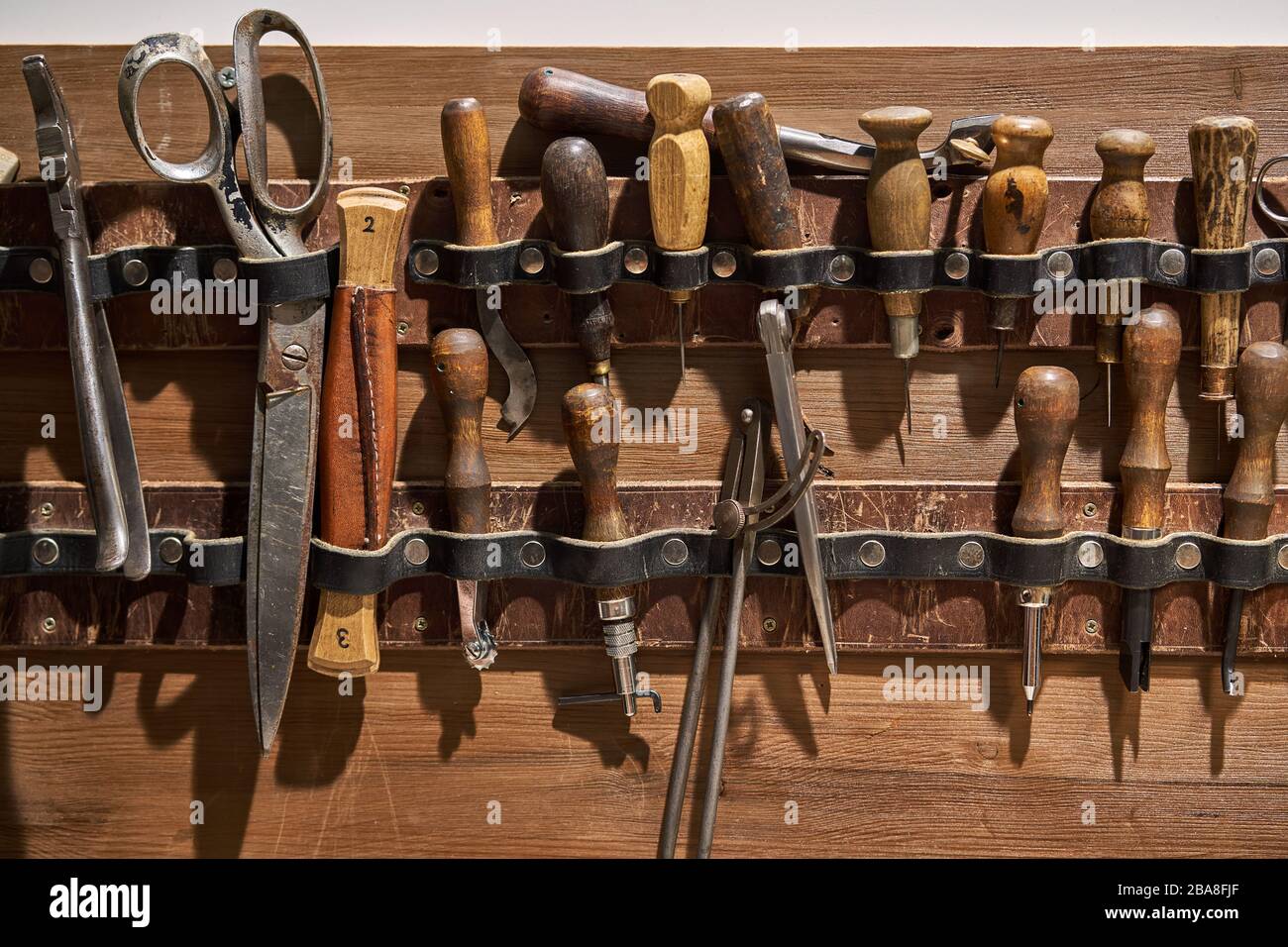 Closeup view at instruments for leather sewing Stock Photo - Alamy