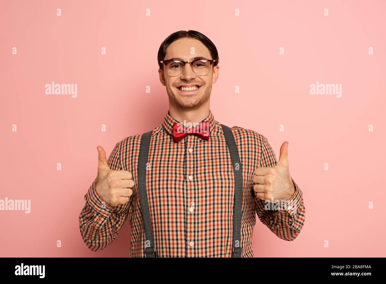 Nerd thumbs up hi-res stock photography and images - Alamy