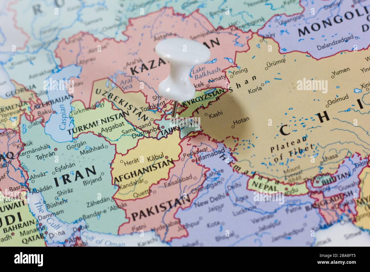 Tajikistan on the map of the world or atlas Stock Photo - Alamy