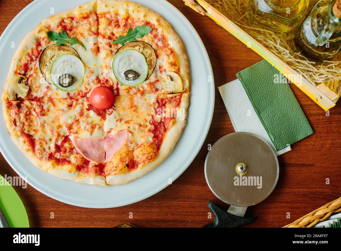 Top view of pizza for kids in a form of funny face, great image for ...