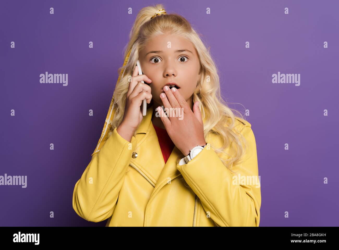 Shocked cute kid talking hi-res stock photography and images - Alamy
