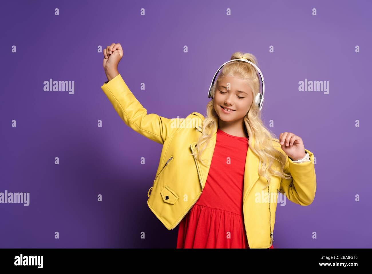 Cute blonde smiling dancing on hi-res stock photography and images - Alamy