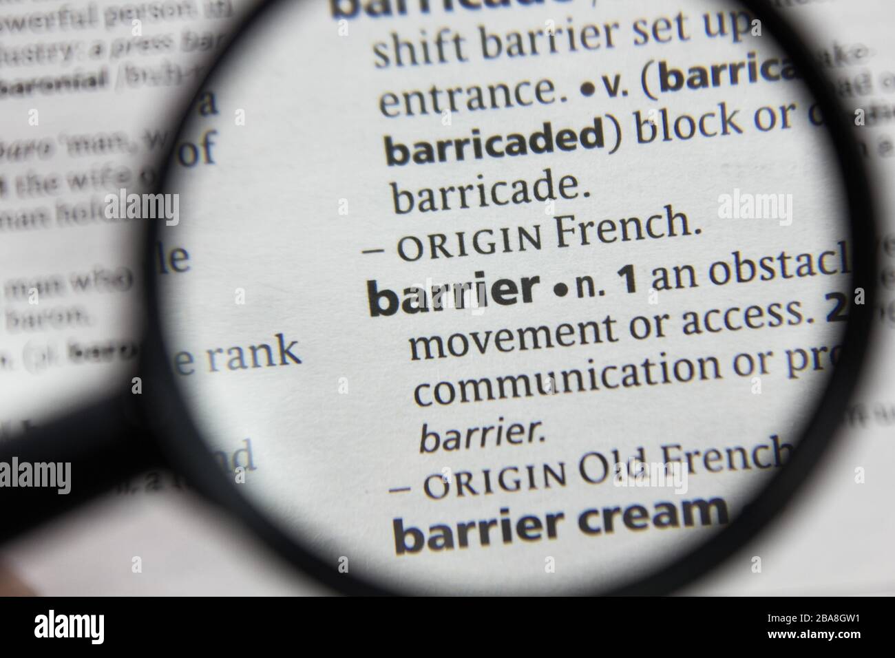 The word or phrase barrier in a dictionary Stock Photo - Alamy