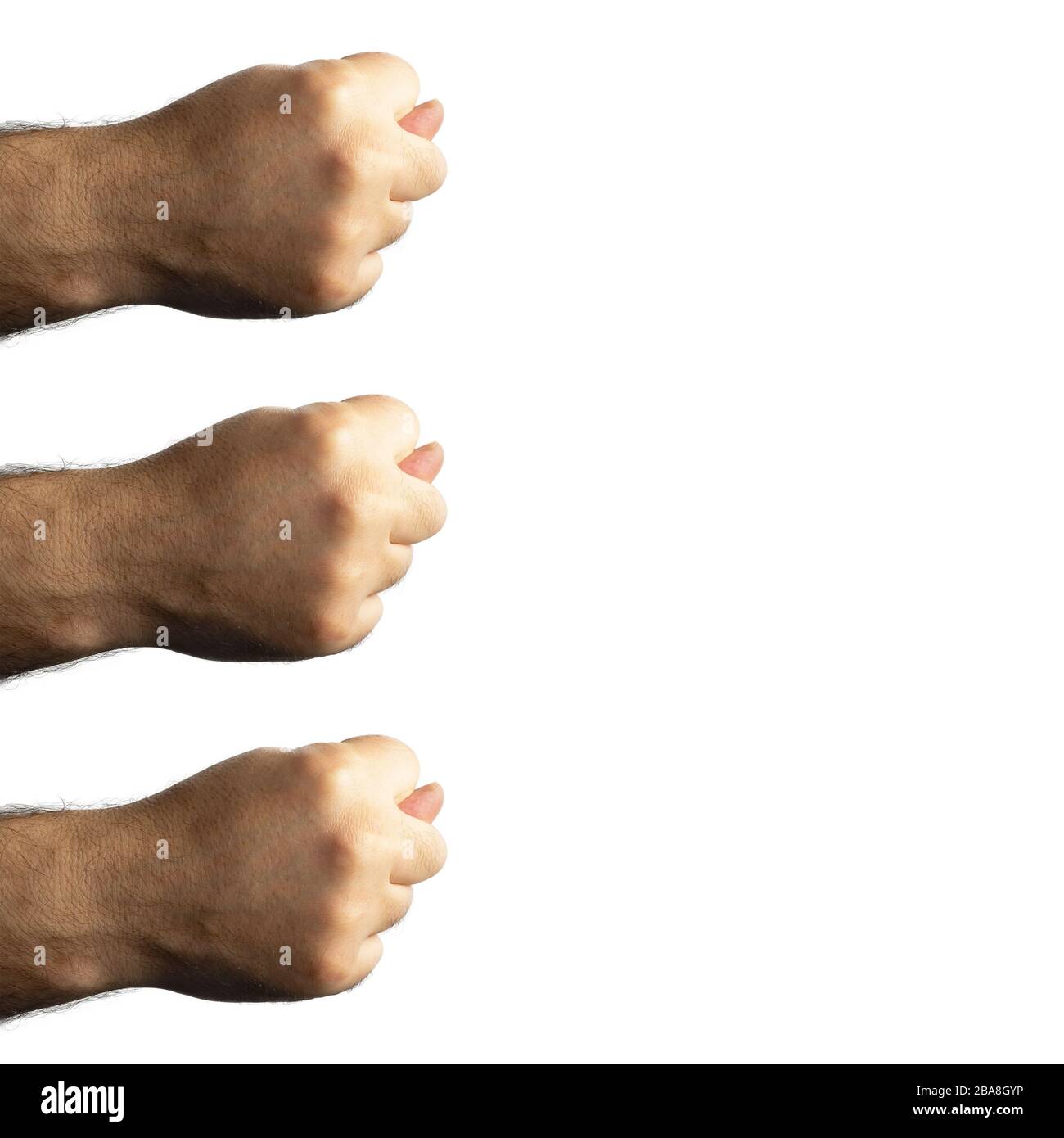 Three male hands clenched into a fist with a thumb sticking out between ...