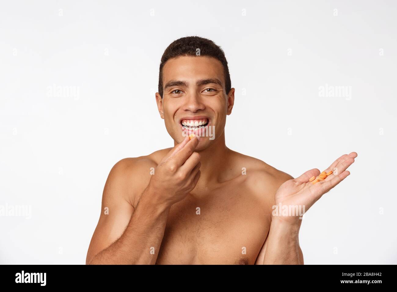 Indian man holding pill hi-res stock photography and images - Alamy