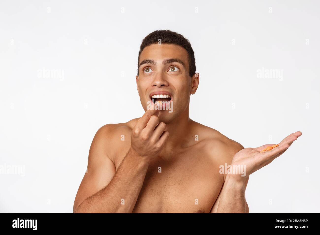 Indian man holding pill hi-res stock photography and images - Alamy