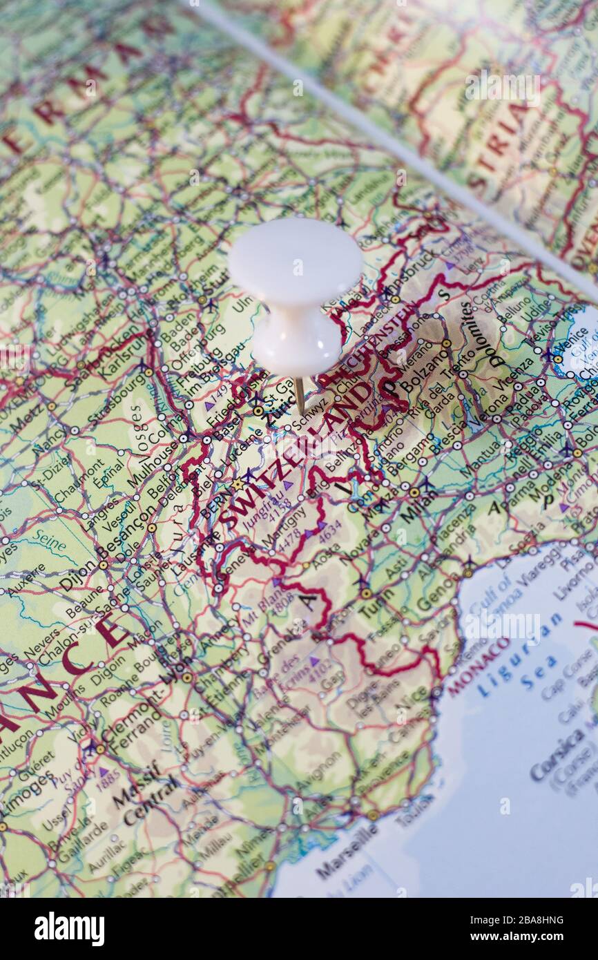 Switzerland on the map of the world or atlas Stock Photo - Alamy