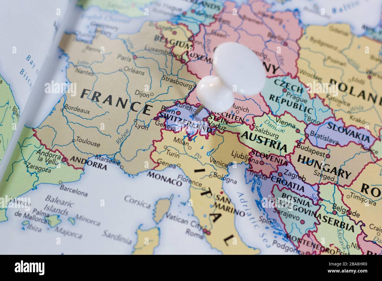 Switzerland on the map of the world or atlas Stock Photo - Alamy