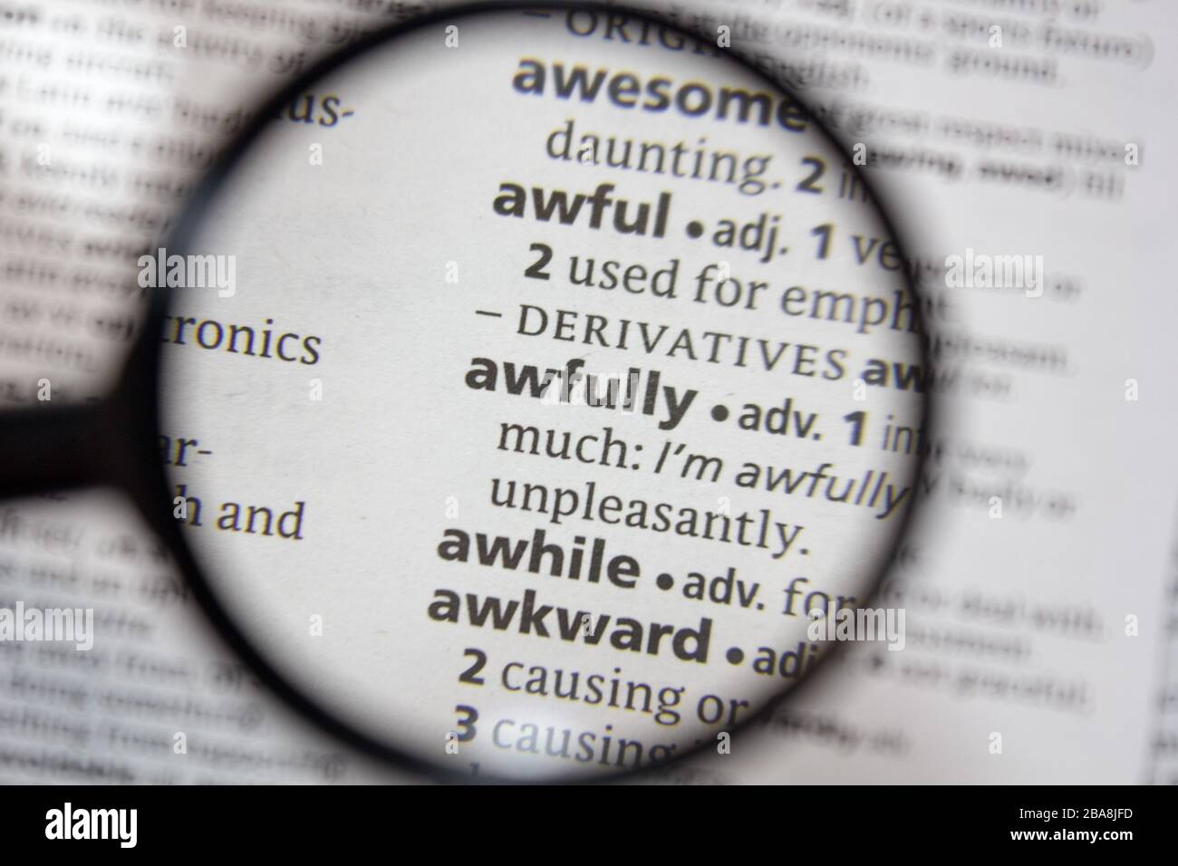 The word of phrase awfully in a dictionary Stock Photo - Alamy