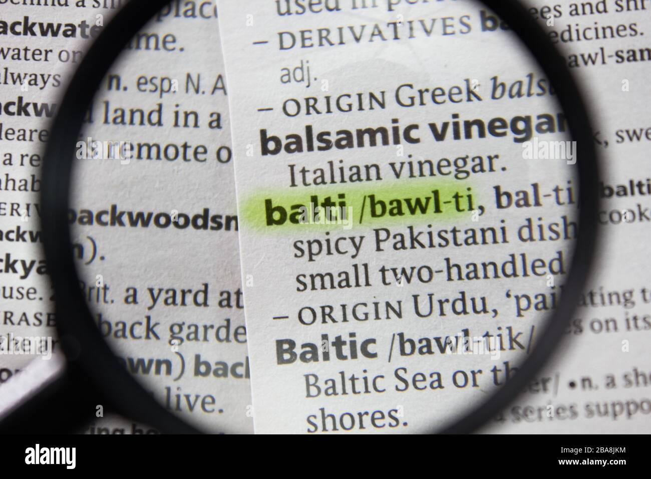 The word or phrase balti in a dictionary Stock Photo - Alamy