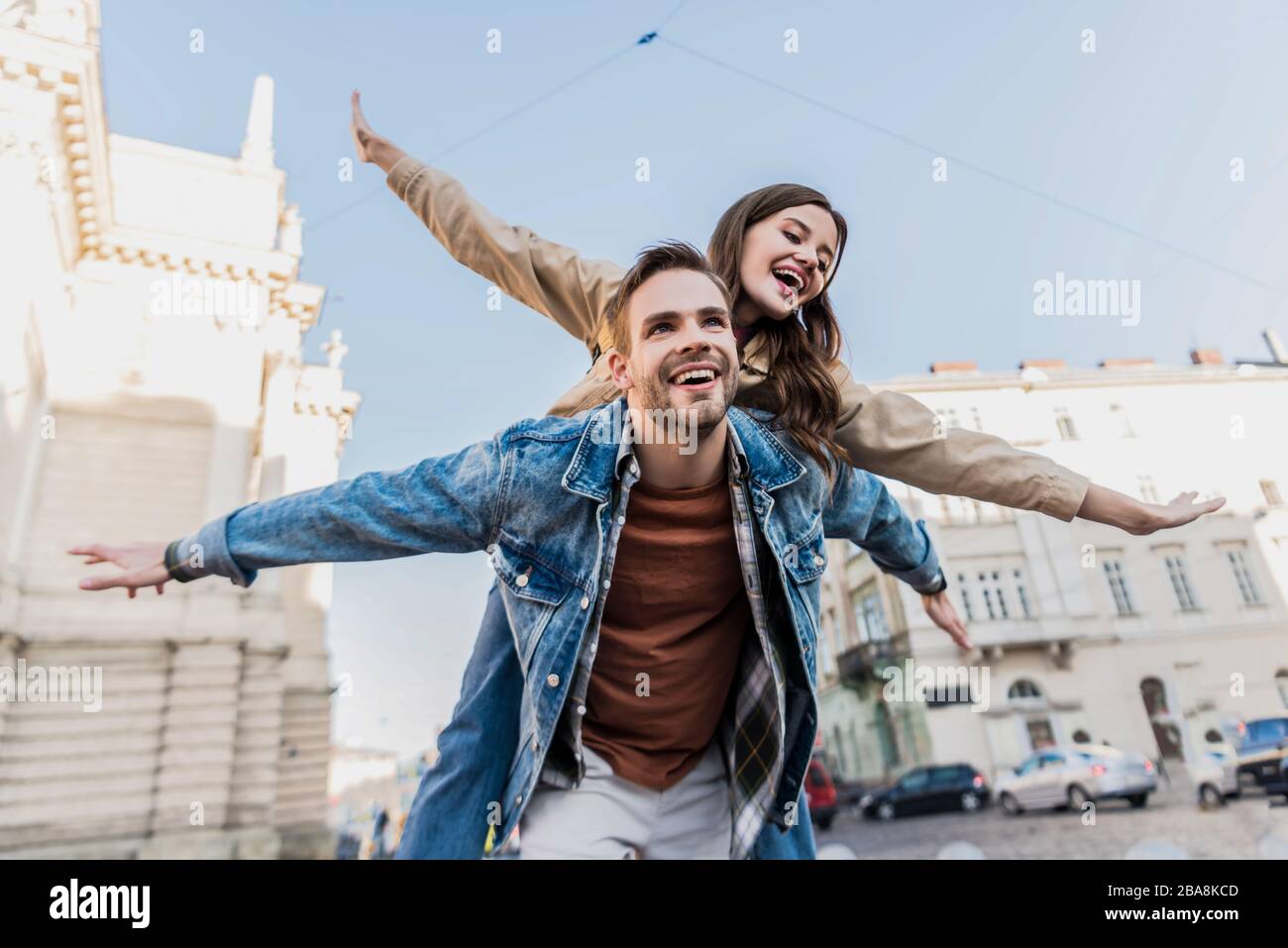 Piggyback pose hi-res stock photography and images - Alamy