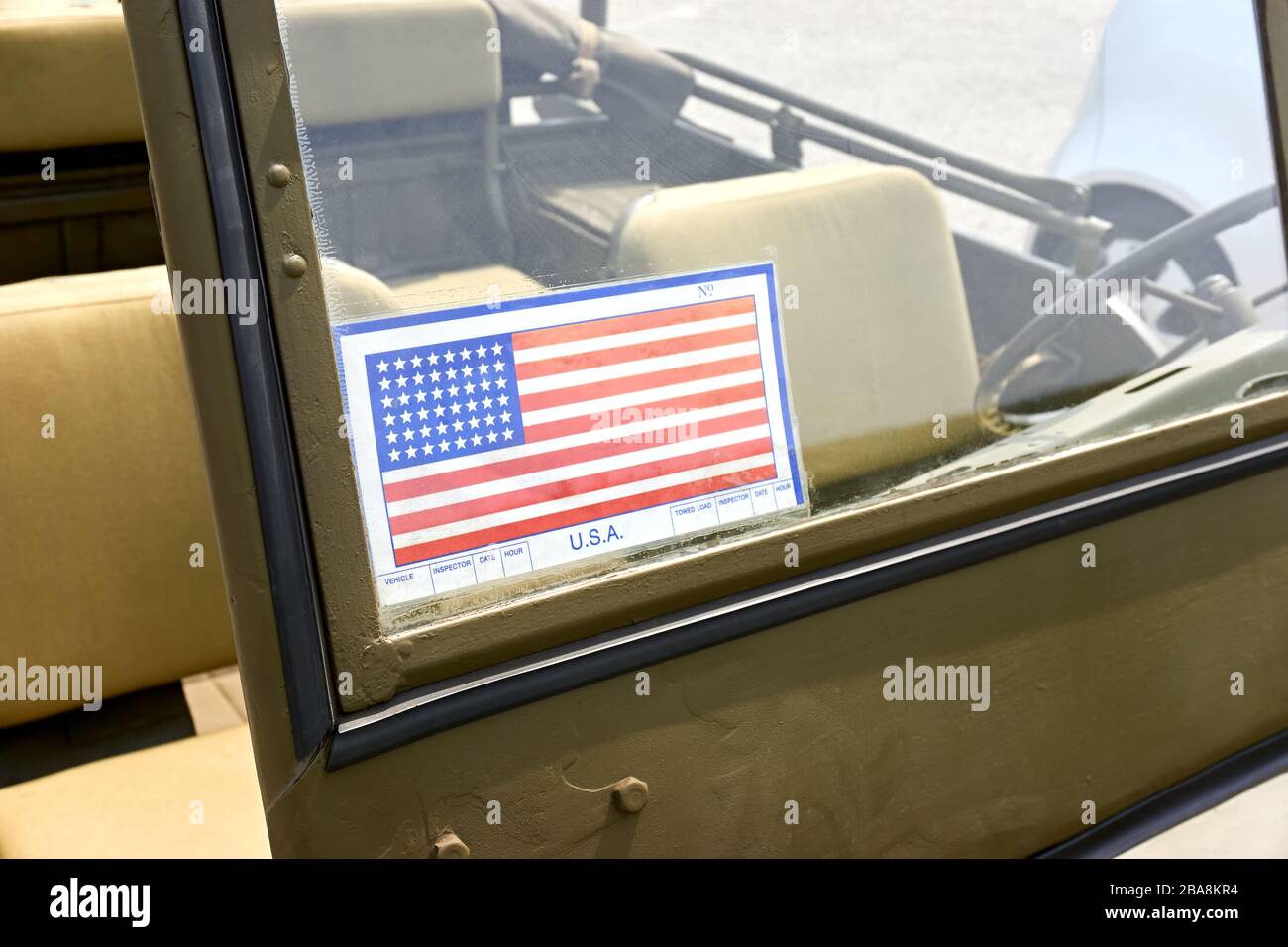 Vehicle inspection decal with American flag with 48 stars on windshield ...