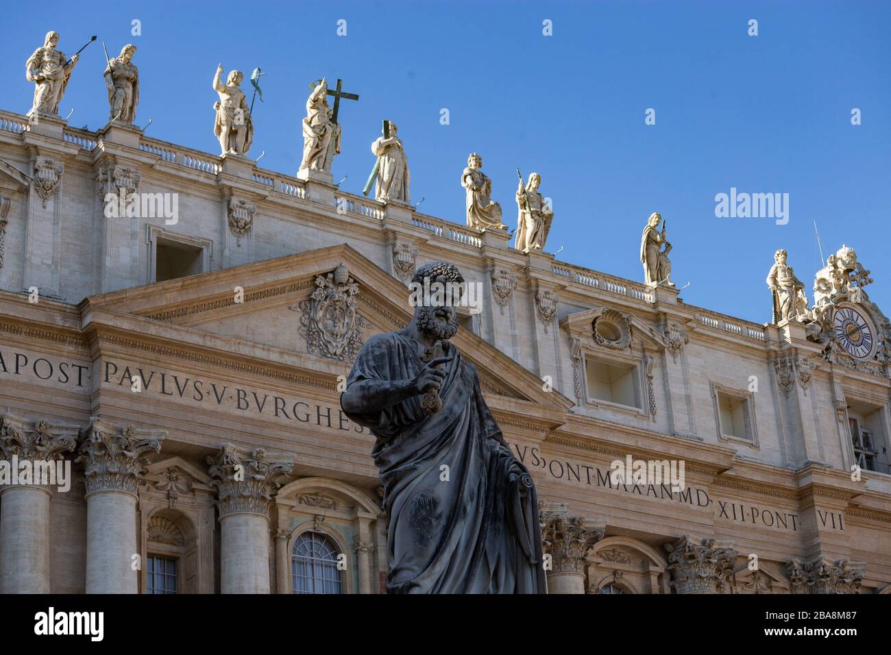 Statue of St. Peter in front of the basilica in Vatican City and other ...
