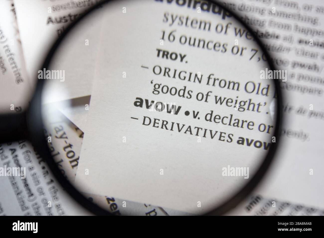 The word of phrase avow in a dictionary Stock Photo - Alamy