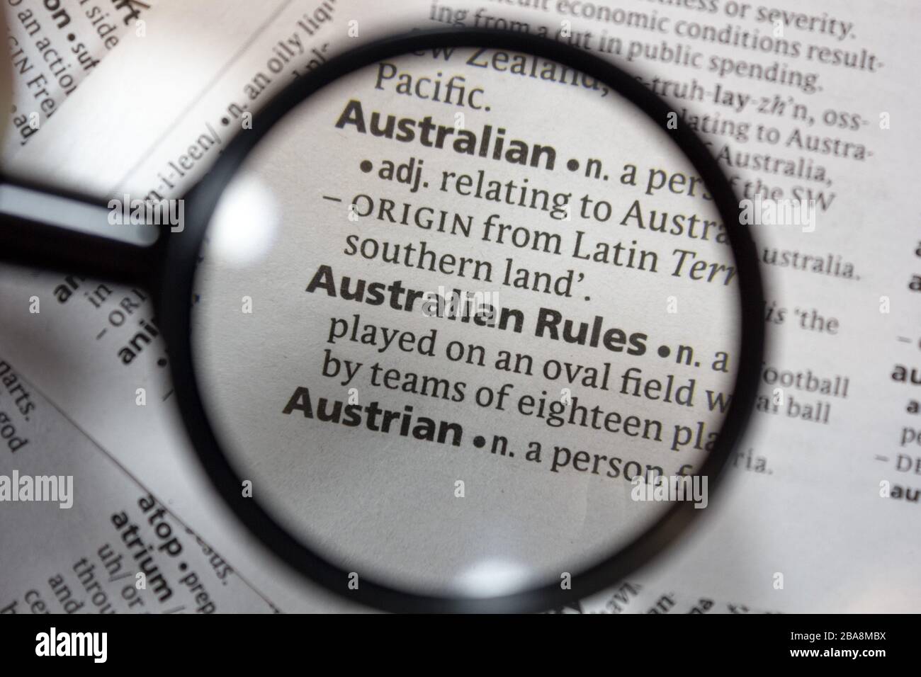 The word of phrase Australian Rules in a dictionary Stock Photo - Alamy