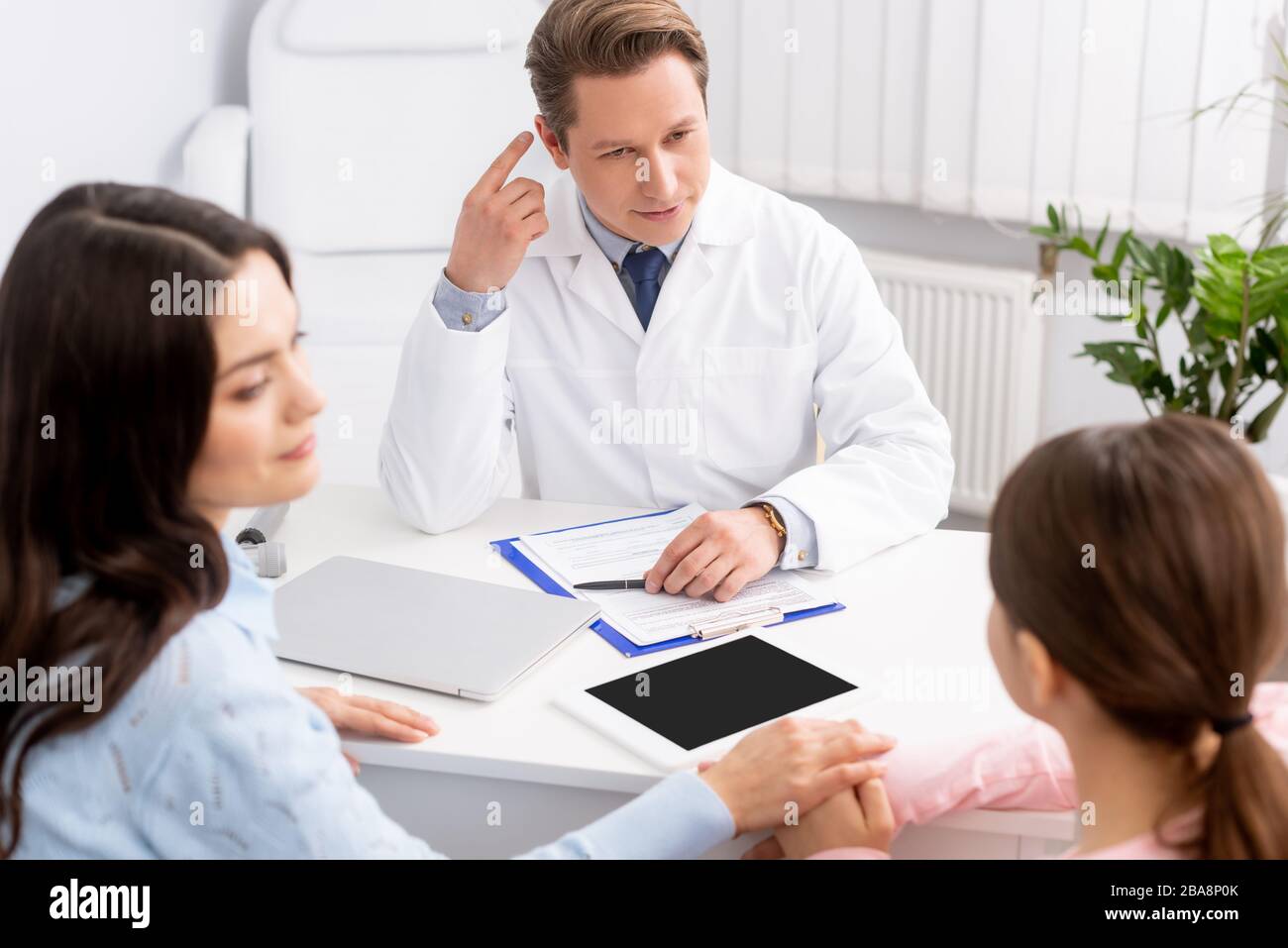 Child finger ear hi-res stock photography and images - Alamy