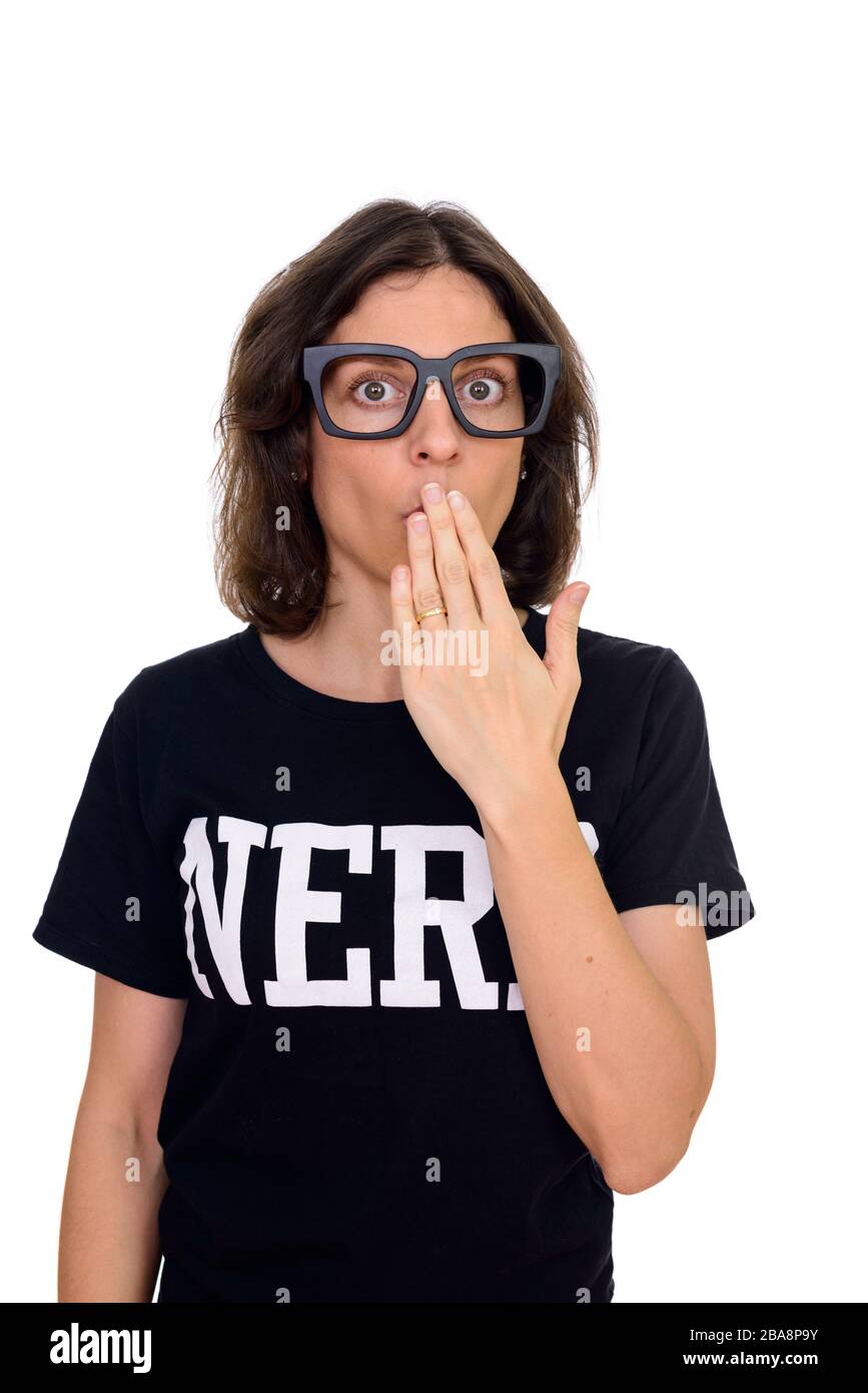 Portrait of beautiful nerd woman with eyeglasses looking shocked Stock ...