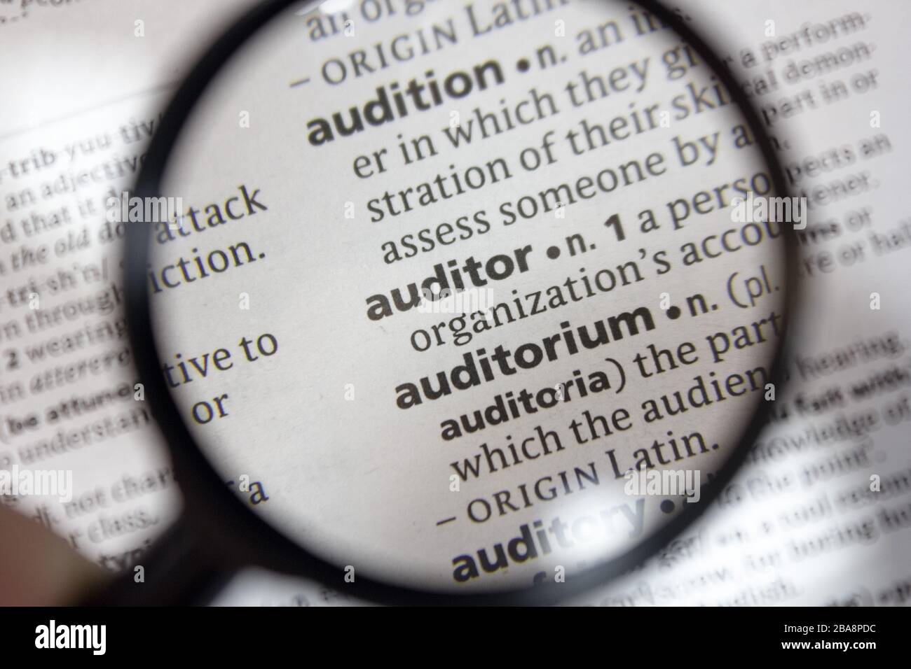 The word of phrase auditor in a dictionary Stock Photo - Alamy