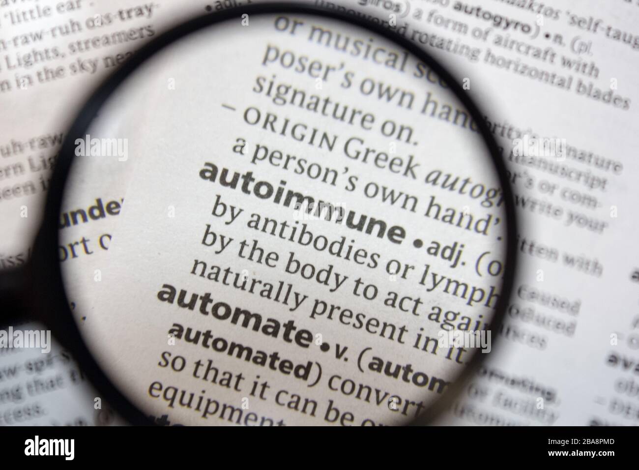 The word of phrase autoimmune in a dictionary Stock Photo - Alamy