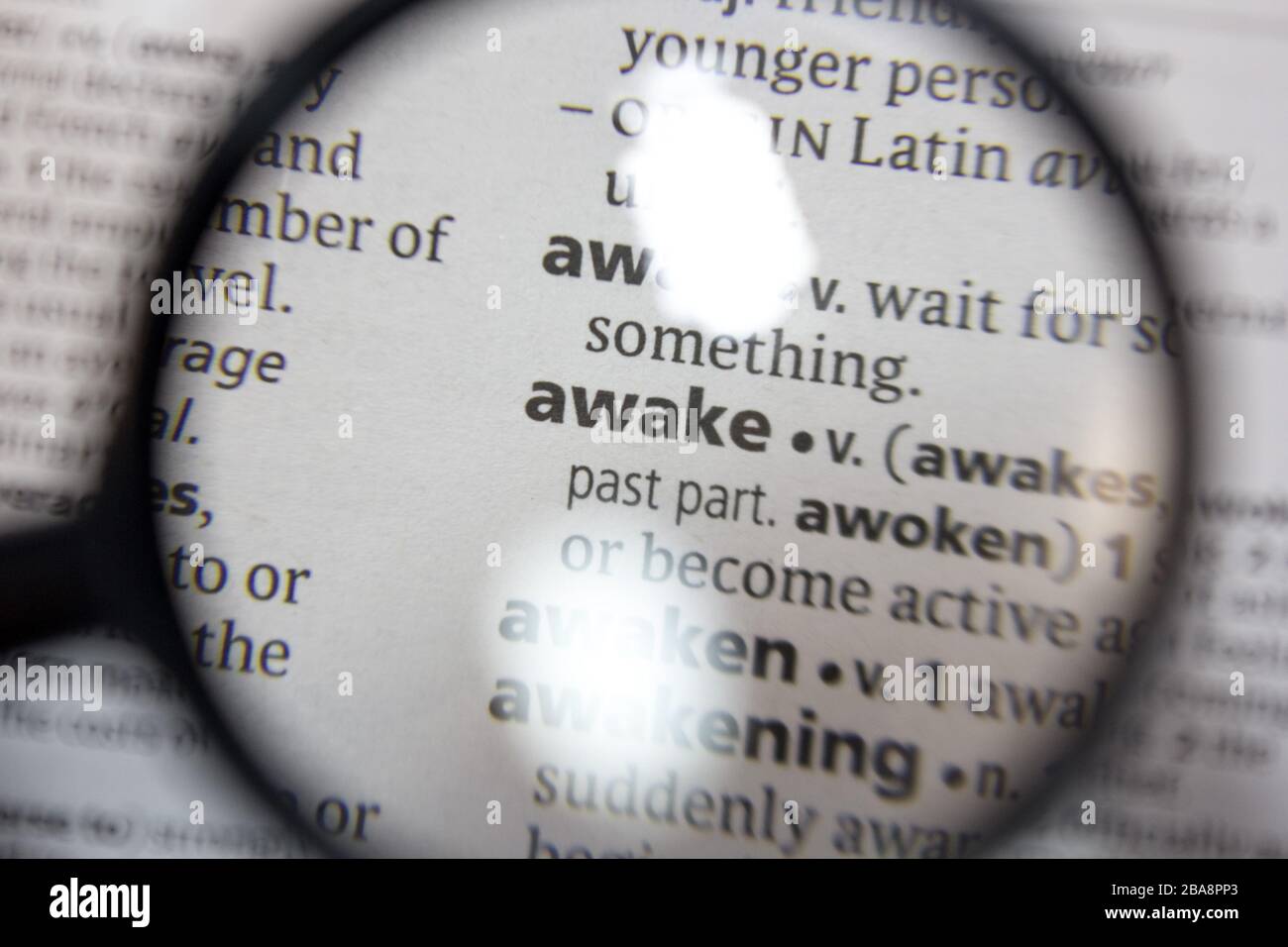 The word of phrase awake in a dictionary Stock Photo - Alamy