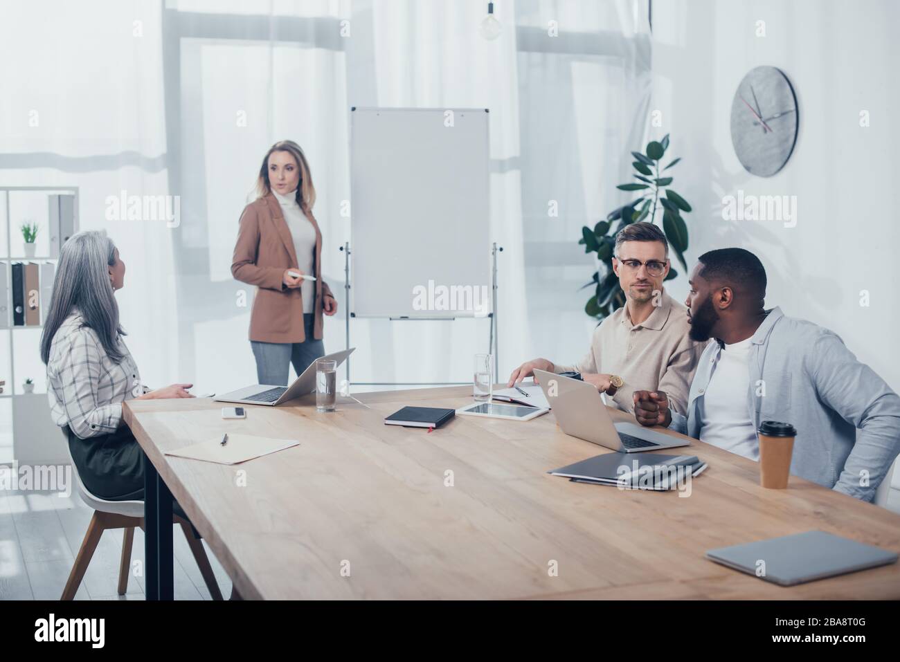 Talking during presentation hi-res stock photography and images - Alamy