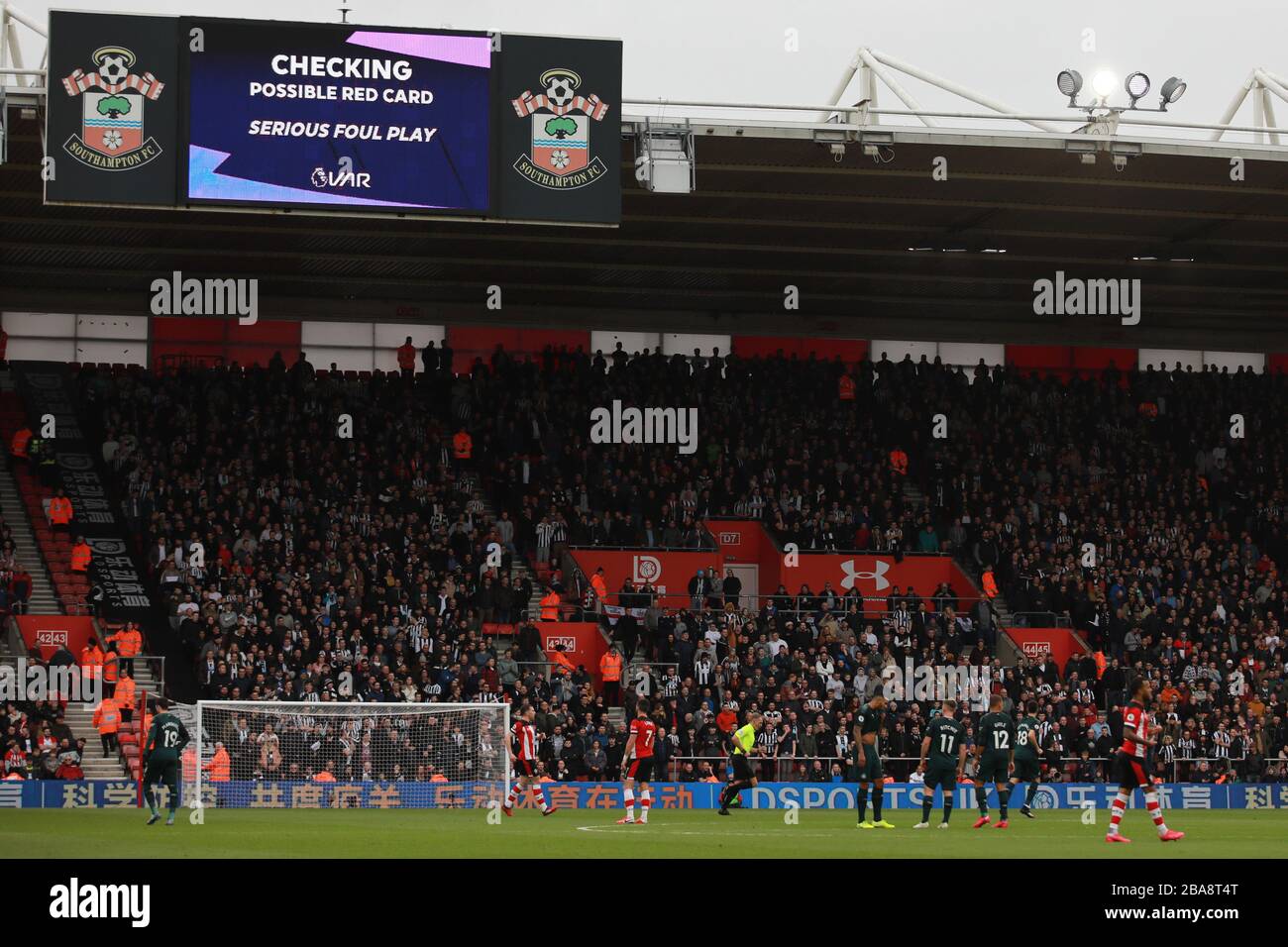 Referee Graham Scott runs over to the VAR pitch side monitor to check a ...