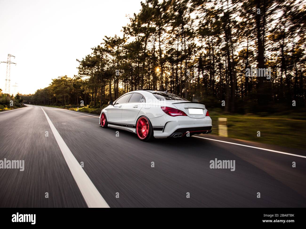 White design business class car in the forest Stock Photo - Alamy