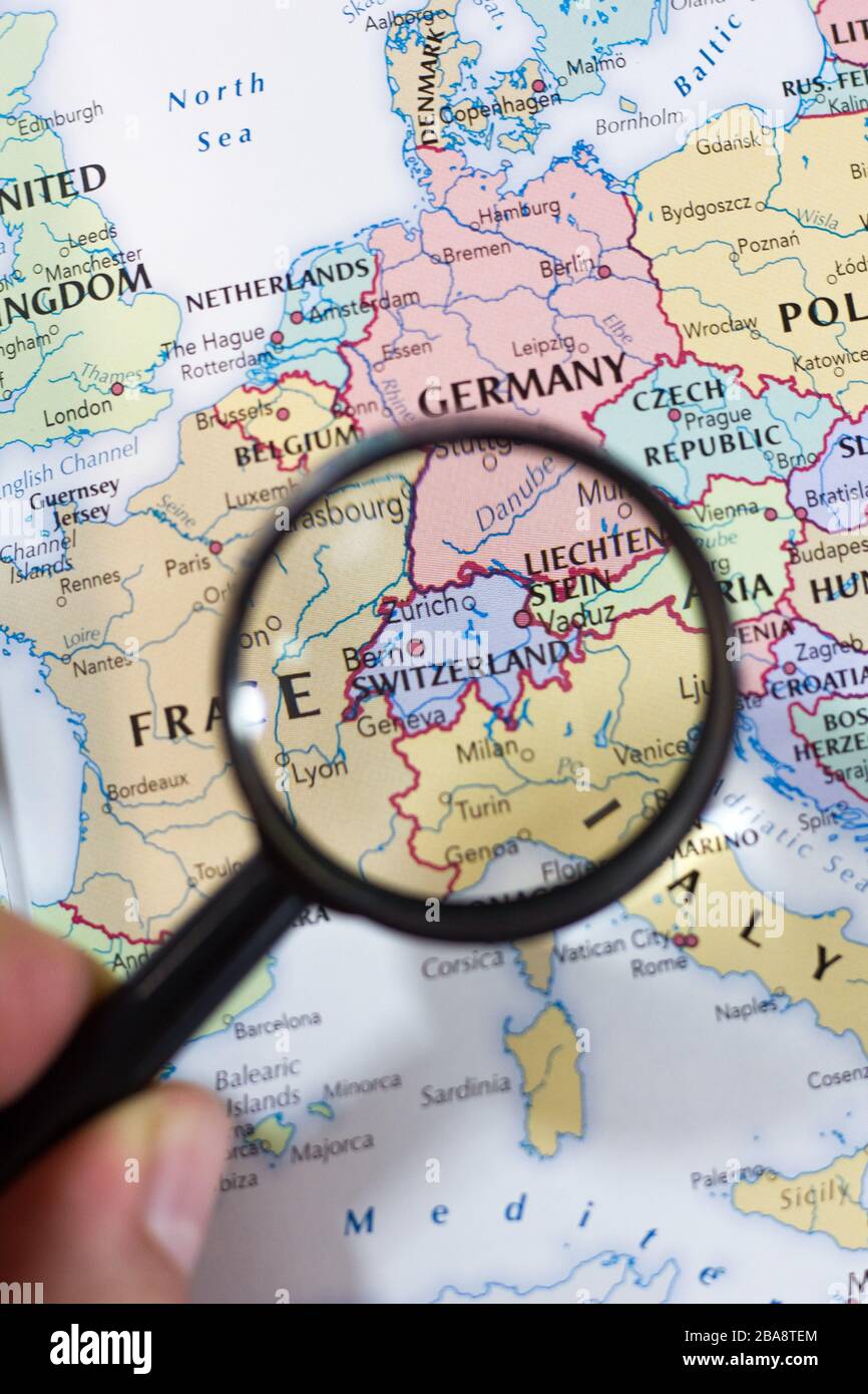 Switzerland on the map of the world or atlas Stock Photo - Alamy